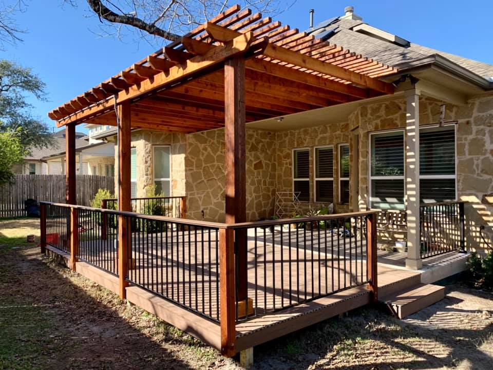 Composite Brown Oak decking with a cedar pergola - Austin Deck Builders